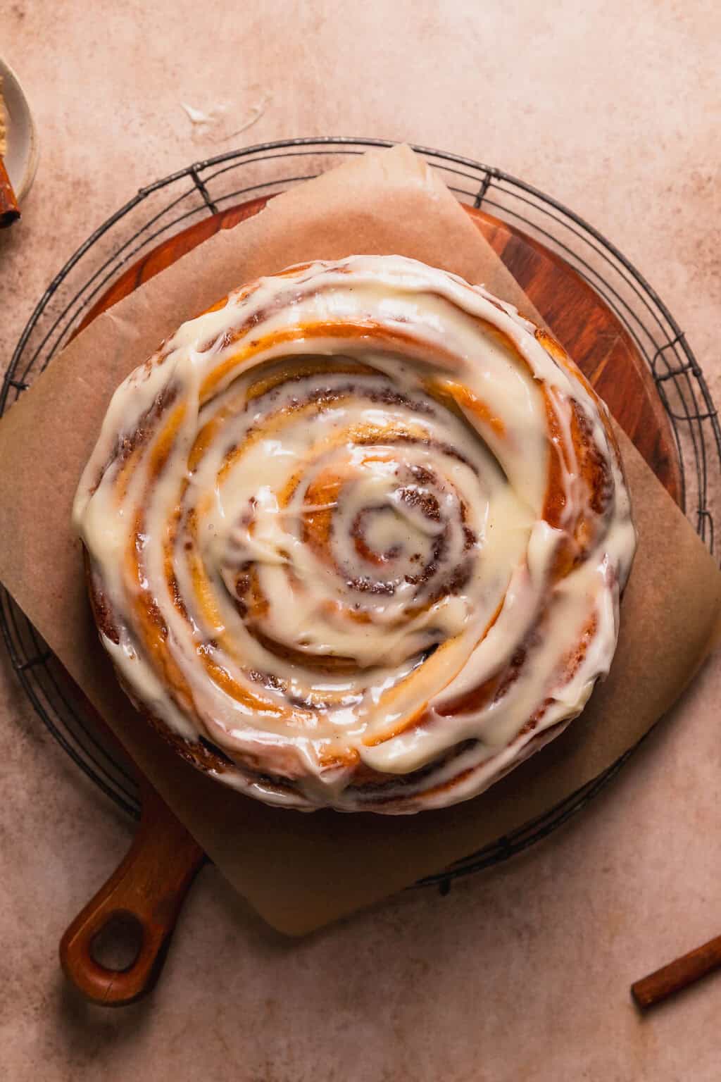 Giant Cinnabon Cinnamon Roll Cake (with video) - Cambrea Bakes